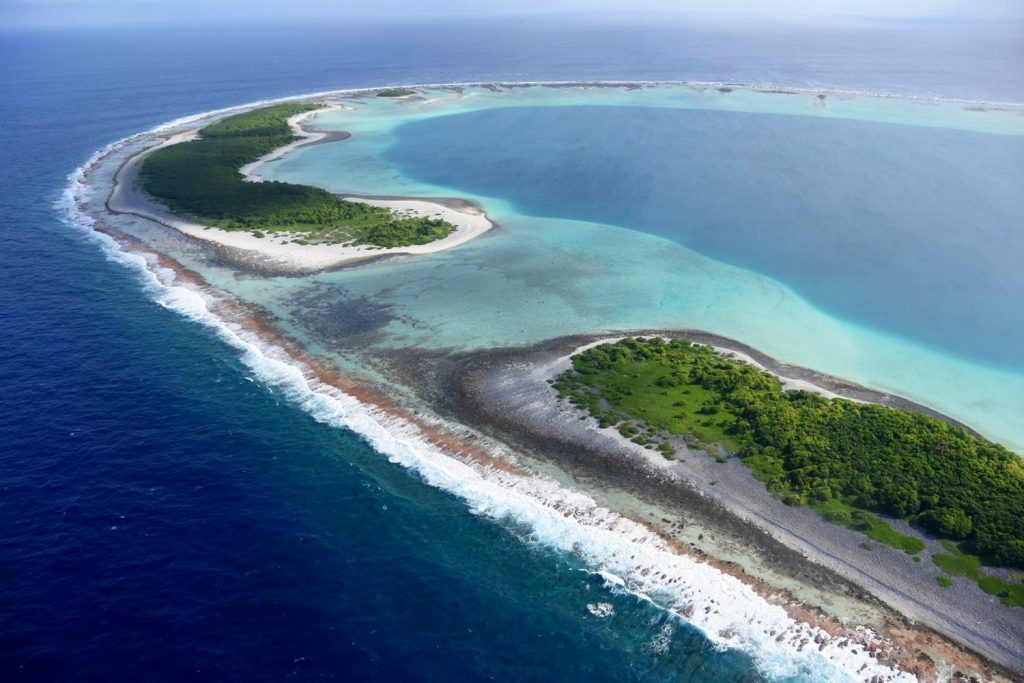 The sweeping ring-shaped atoll of Anuanurunga in French Polynesia is a ...